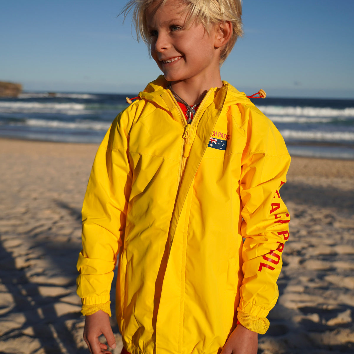 Kids Lifeguard Spray Jacket | Between The Flags | Surf Shop Australia
